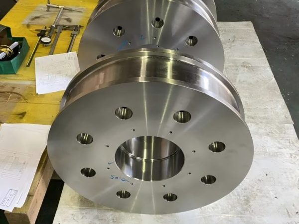 What Are the Steps Involved In Forging Wheel Forgings?